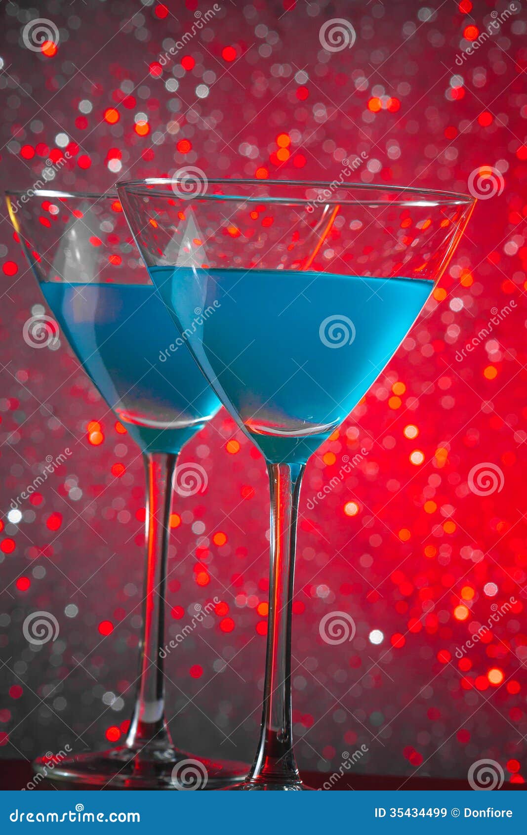A Pair of Glasses of Blue Cocktail on Table Stock Image - Image of ...