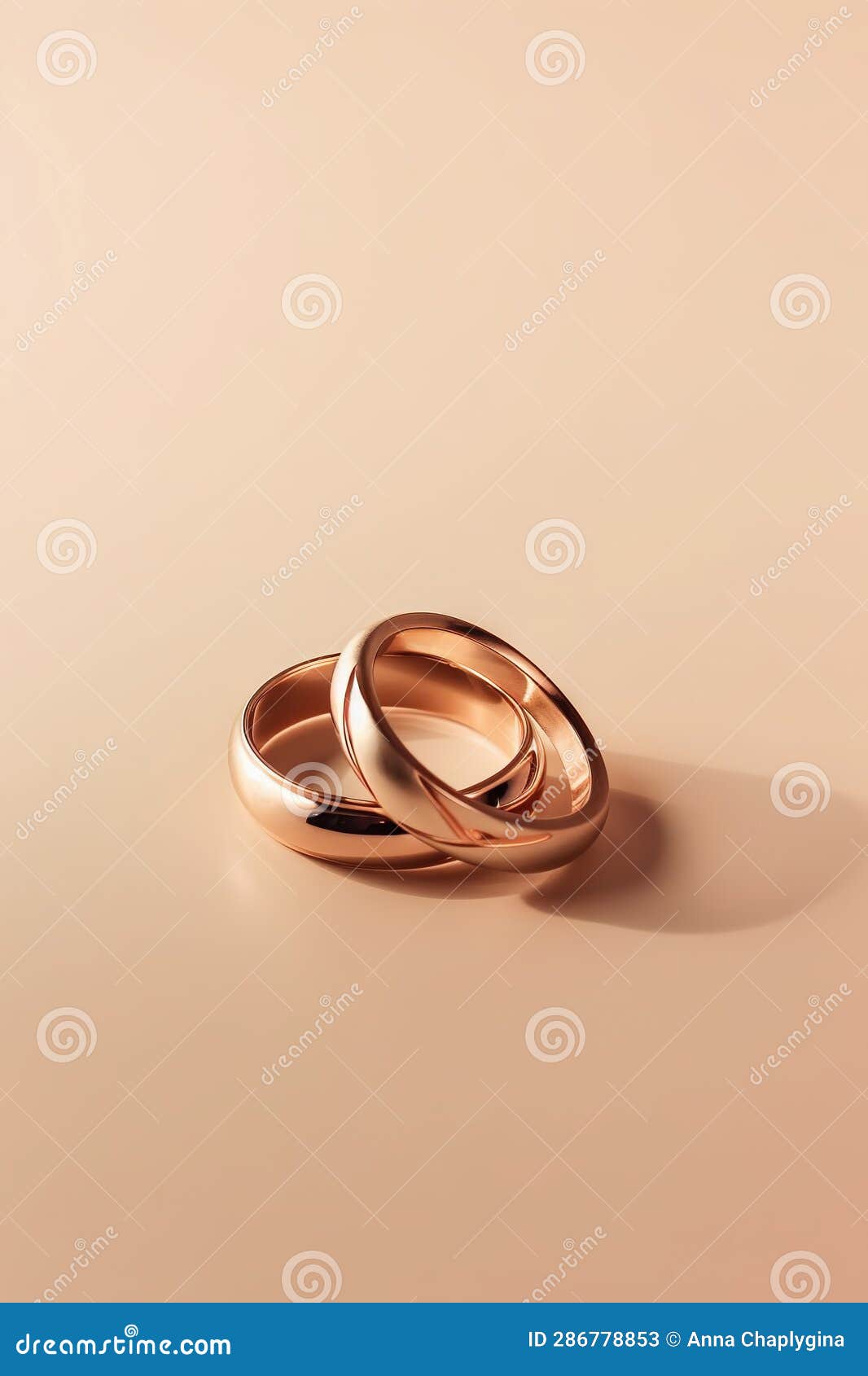 A Pair of Gold Wedding Rings on Pastel Background Stock Image - Image ...