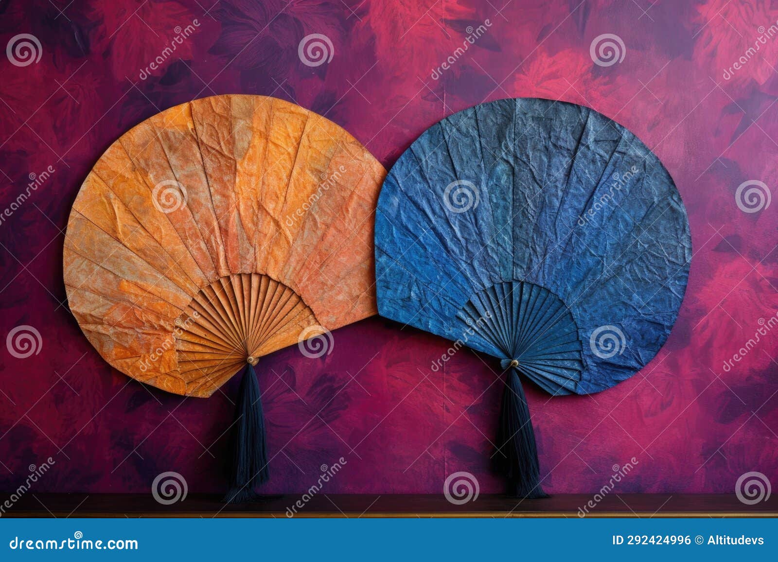 A Pair of Hand Fans Crossed on a Vibrant, Textured Backdrop Stock Photo ...