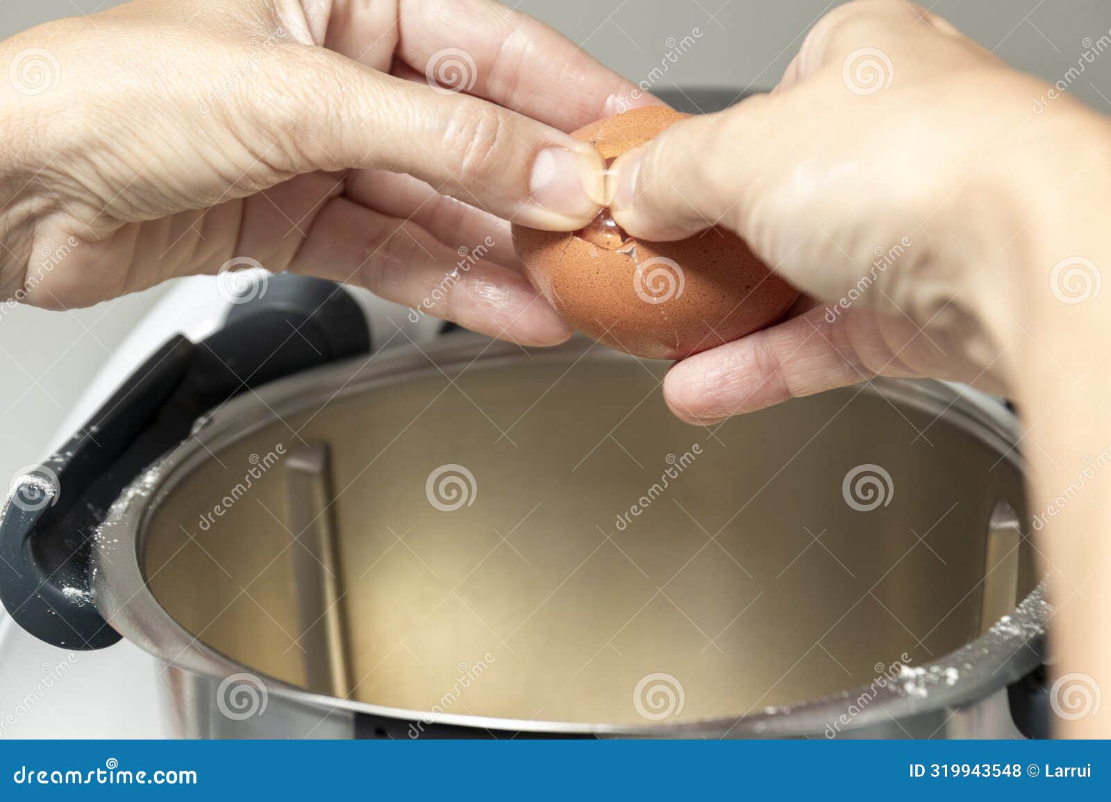 Hands Cracking Egg Royalty-Free Stock Image | CartoonDealer.com #26258482