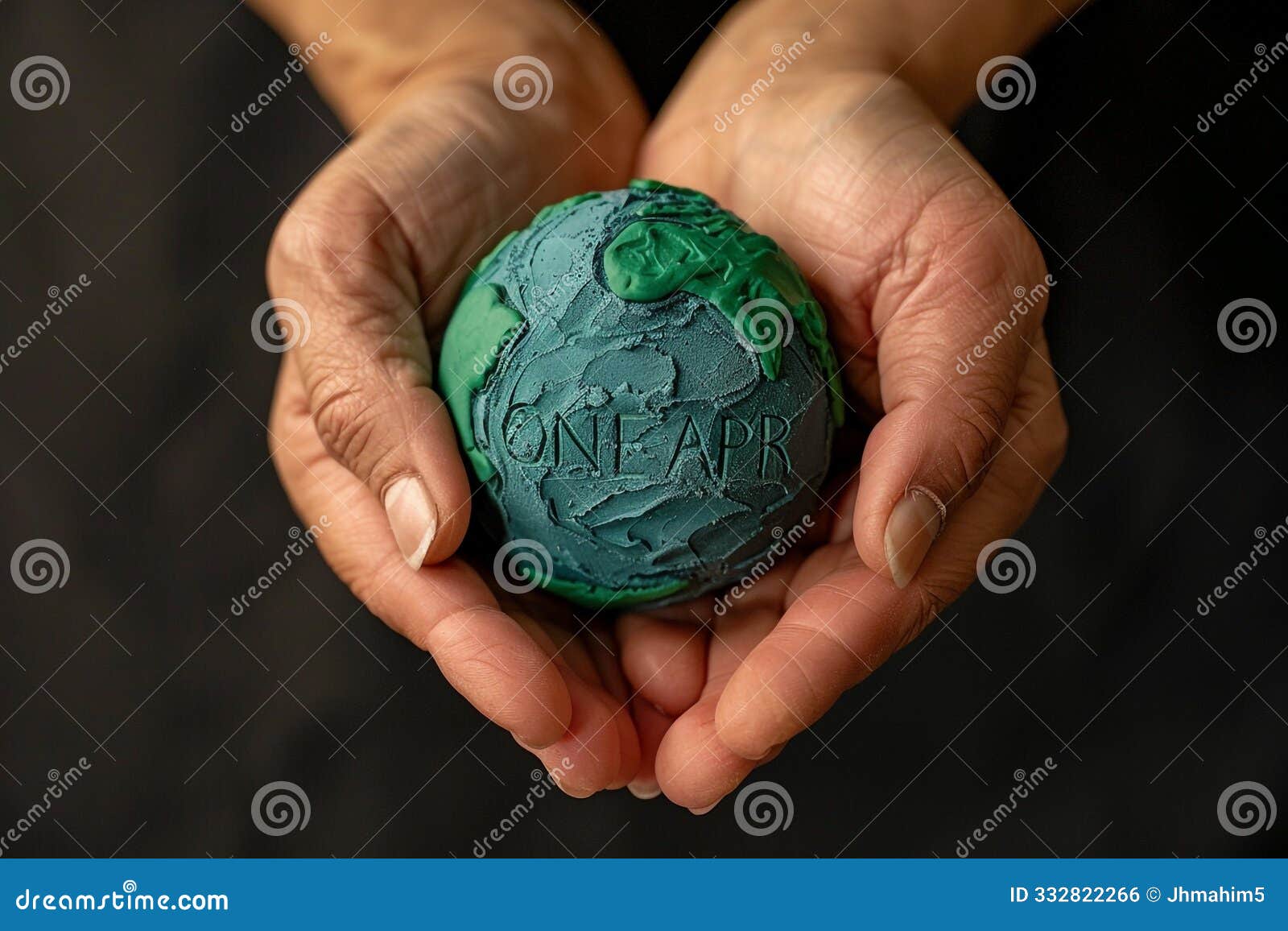 A Pair of Human Hands Gently Cradles a Stylized Clay Model of the Earth ...