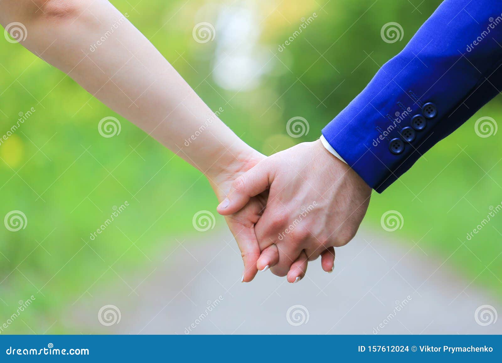 A Pair of Lovers Holding Hands Stock Photo - Image of care, hands ...
