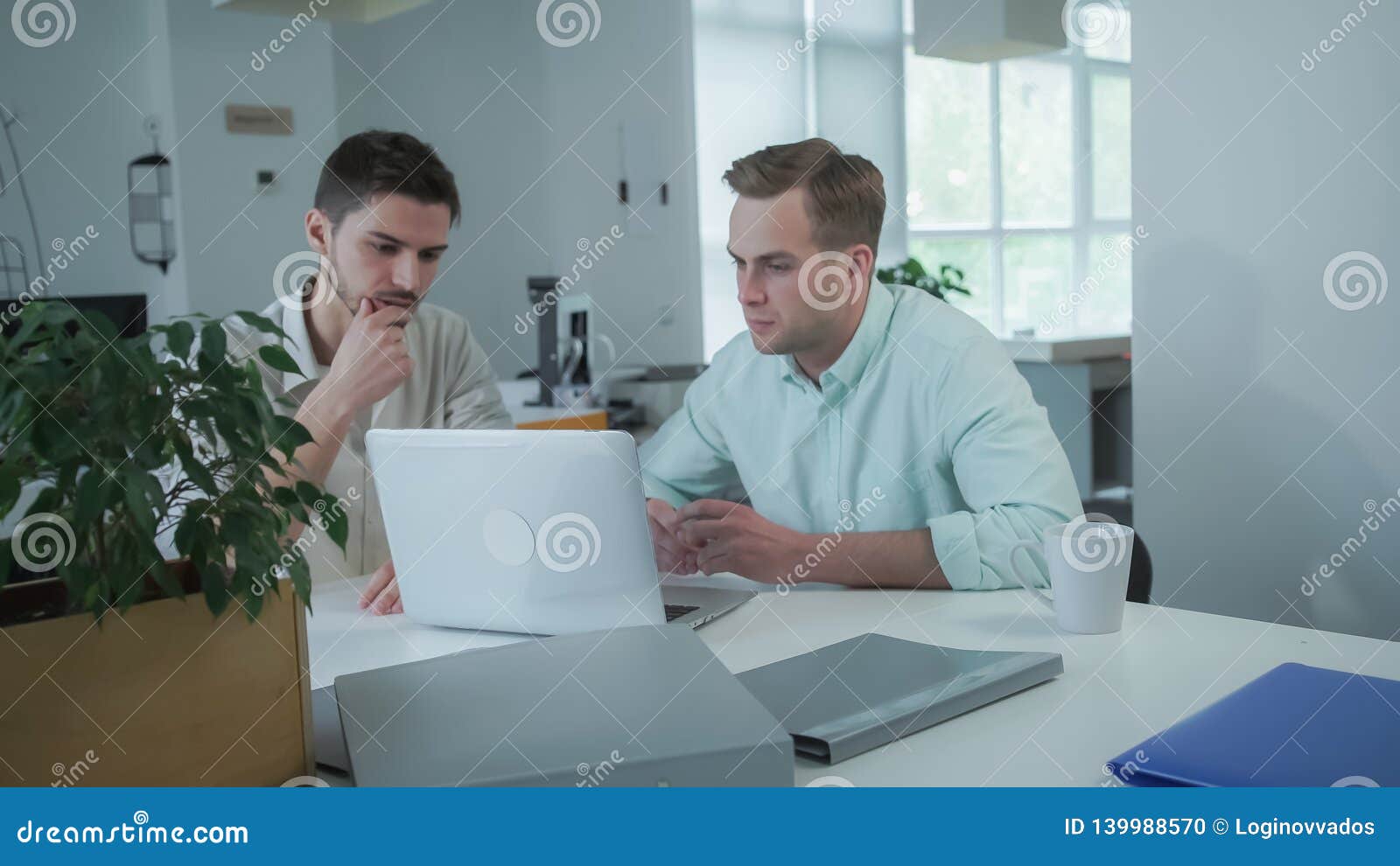 Pair of Men Working Together in the Modern Studio. Stock Photo - Image ...
