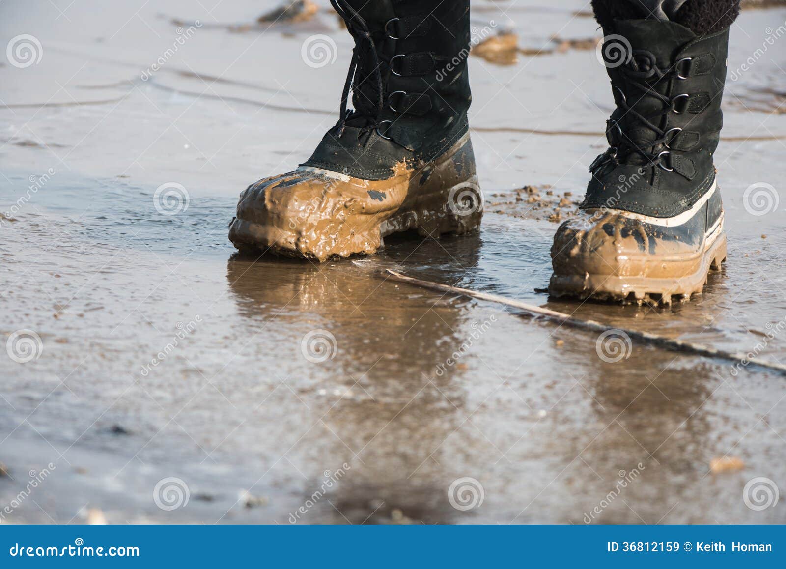 Pair of muddy Boots stock image. Image of weather, sytle - 36812159