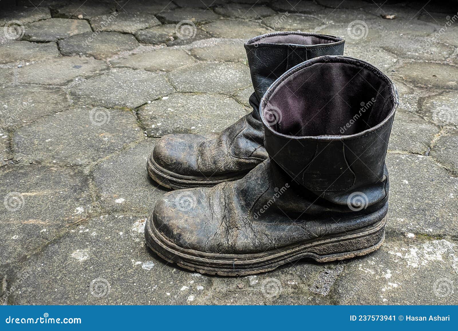 A Pair of Old Boots on the Floor Stock Image - Image of statue, boots ...