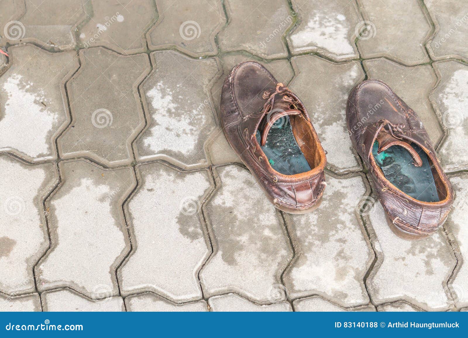 Pair of Old Brown Leather Shoes on Cement Stock Photo - Image of ...