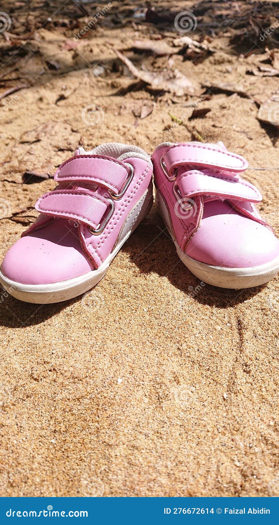 A Pair of Pink Shoes on the Sand at Temajok Beach Stock Photo - Image ...
