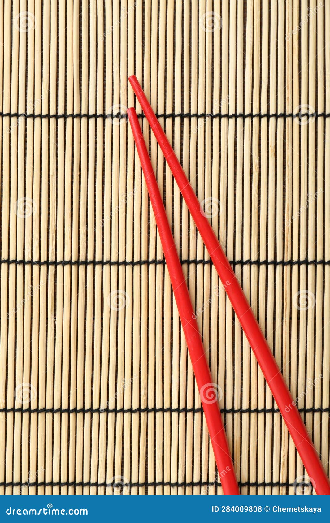 Pair of Red Chopsticks on Bamboo Mat, Top View Stock Photo - Image of ...