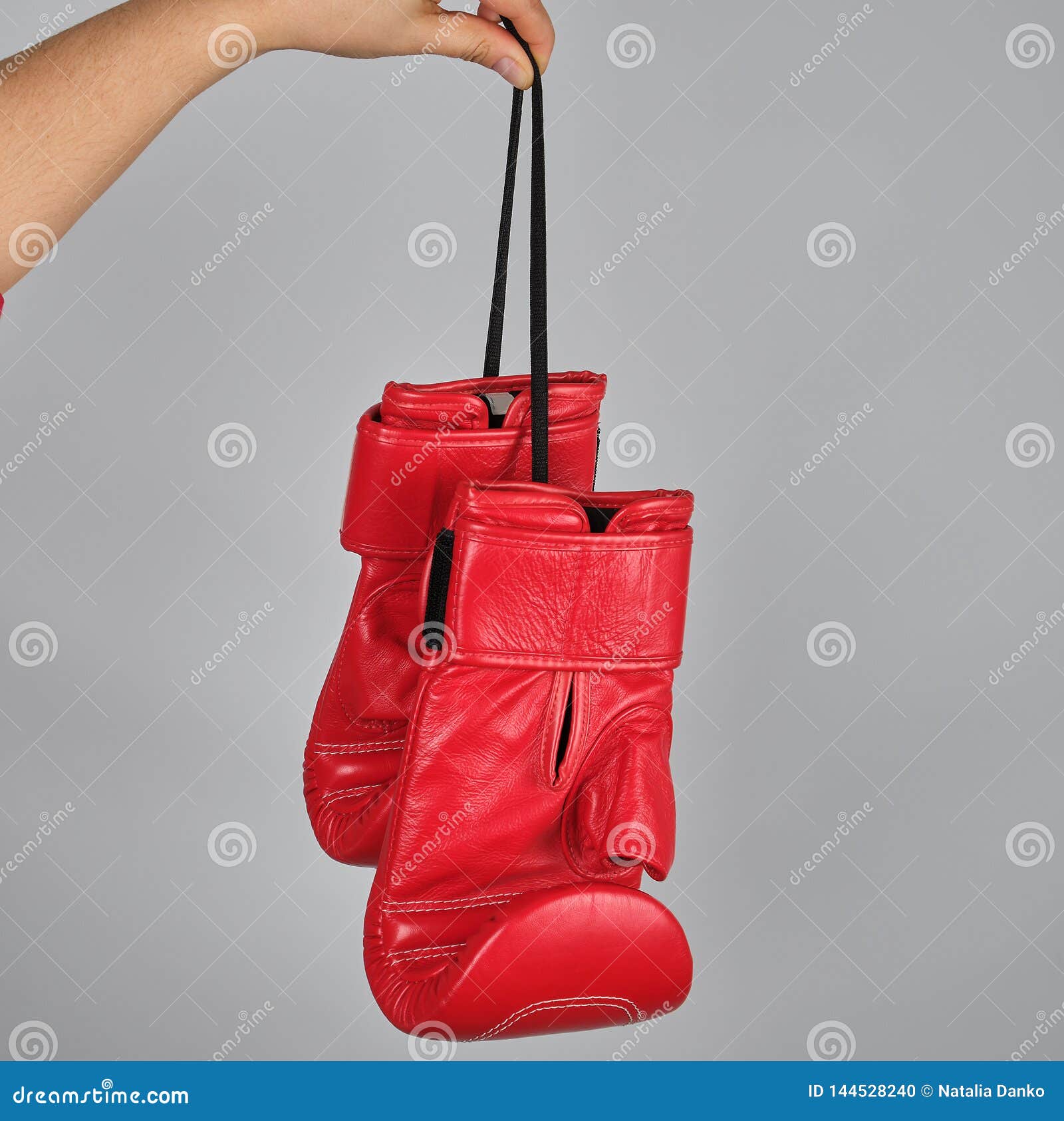Pair of Red Leather Boxing Gloves Hang on a String Stock Photo - Image ...