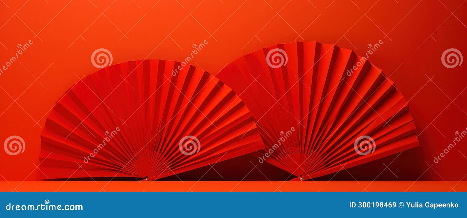 A Pair of Red Paper Fans on a Red Background, Panoramic Scale Stock ...