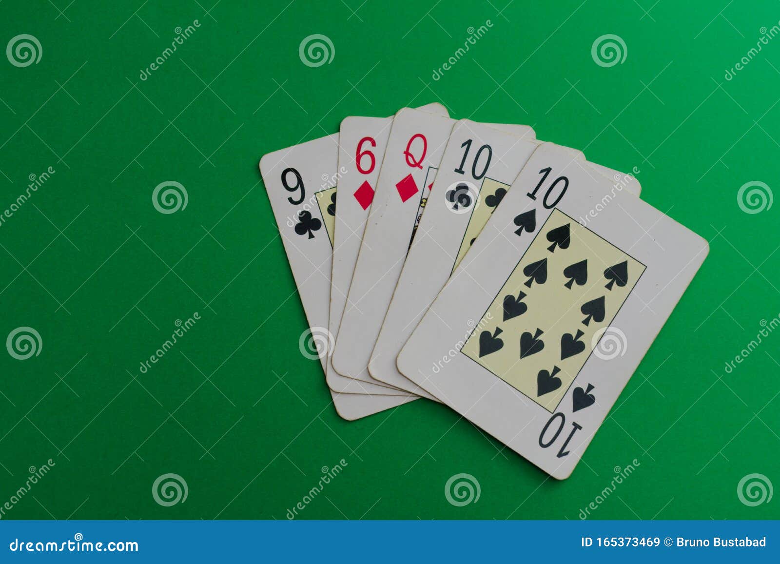 A Pair of 10`s Cards of a Poker Deck Over a Green Background Stock ...