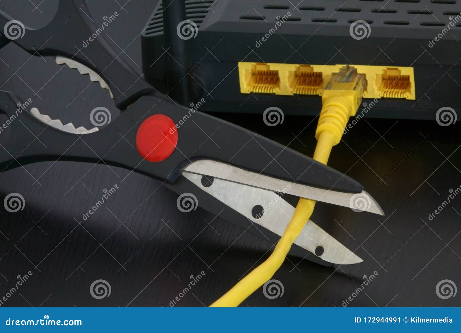 Cutting an Ethernet Cable Connected To an Internet Modem with Scissors ...
