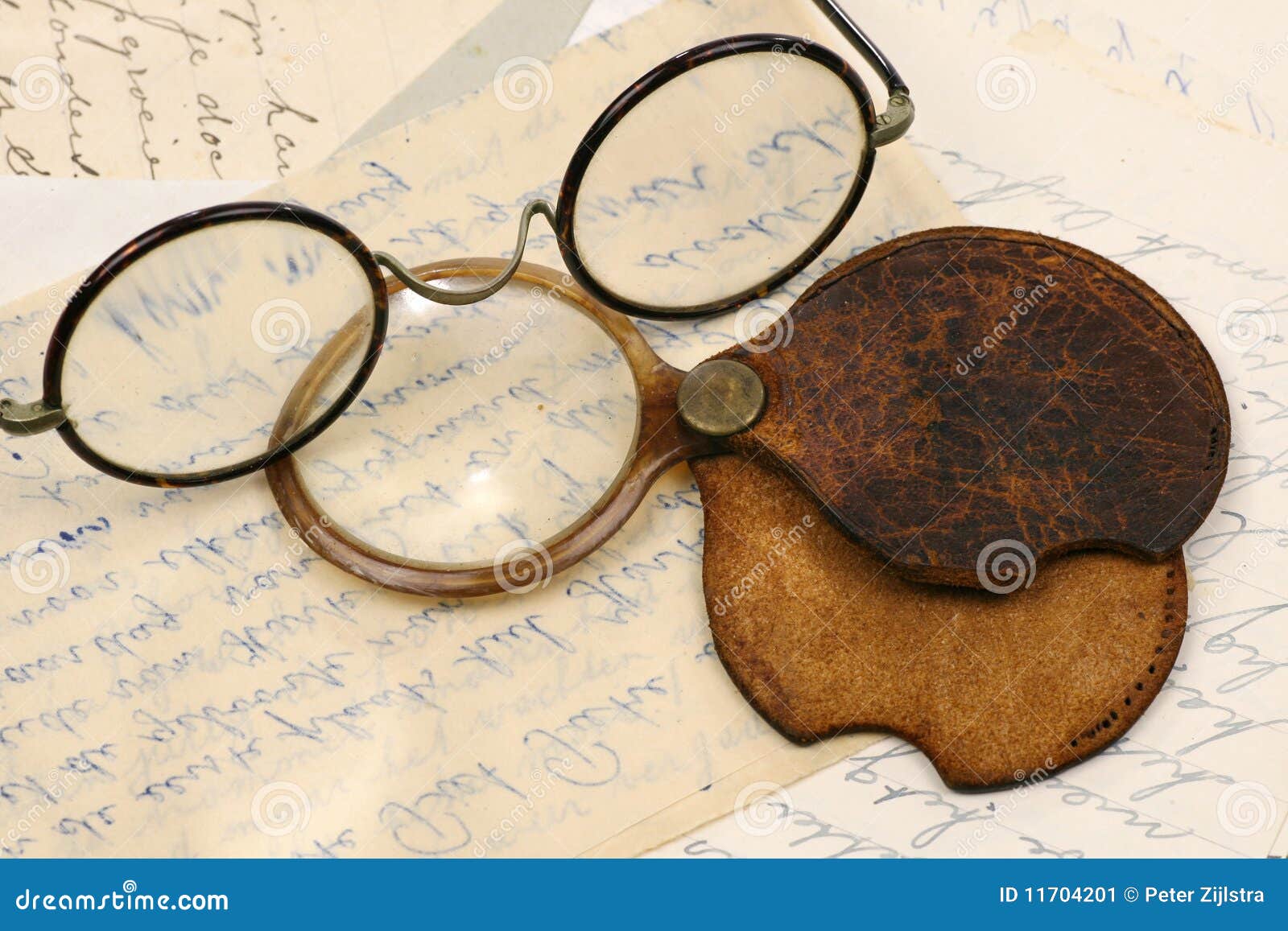 A Pair of Spectacles and a Magnifying Glass Stock Image - Image of ...