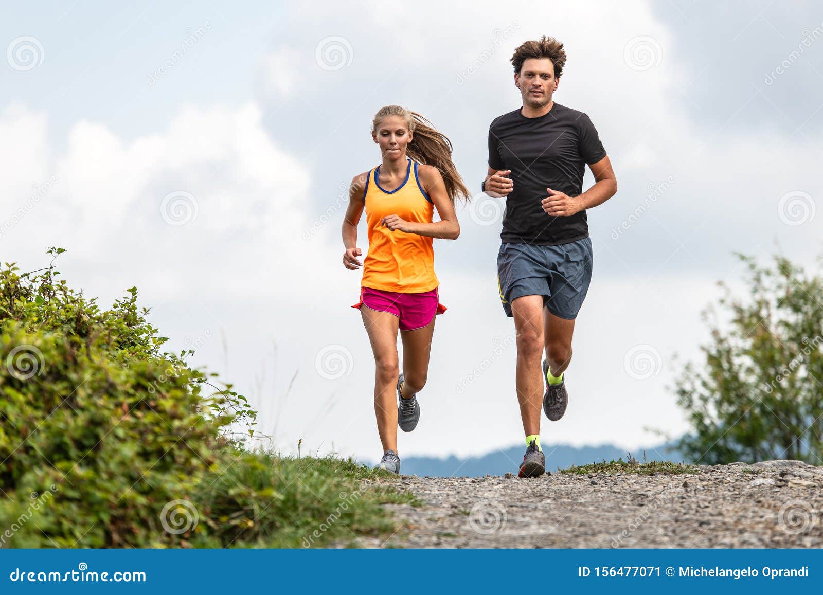 Pair of Trail Runners in the Mountains Stock Image - Image of runner ...