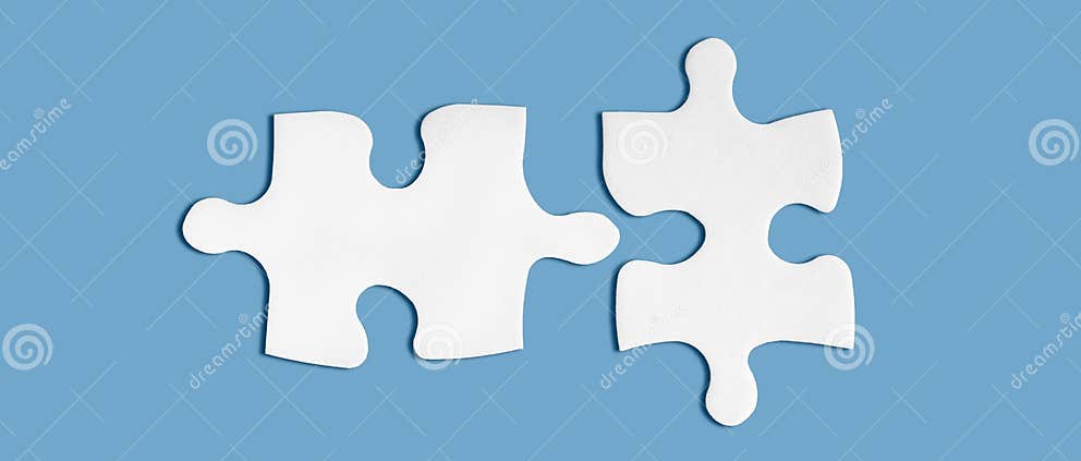 Pair of Two Matching Puzzle Pieces Isolated on Blue Background ...
