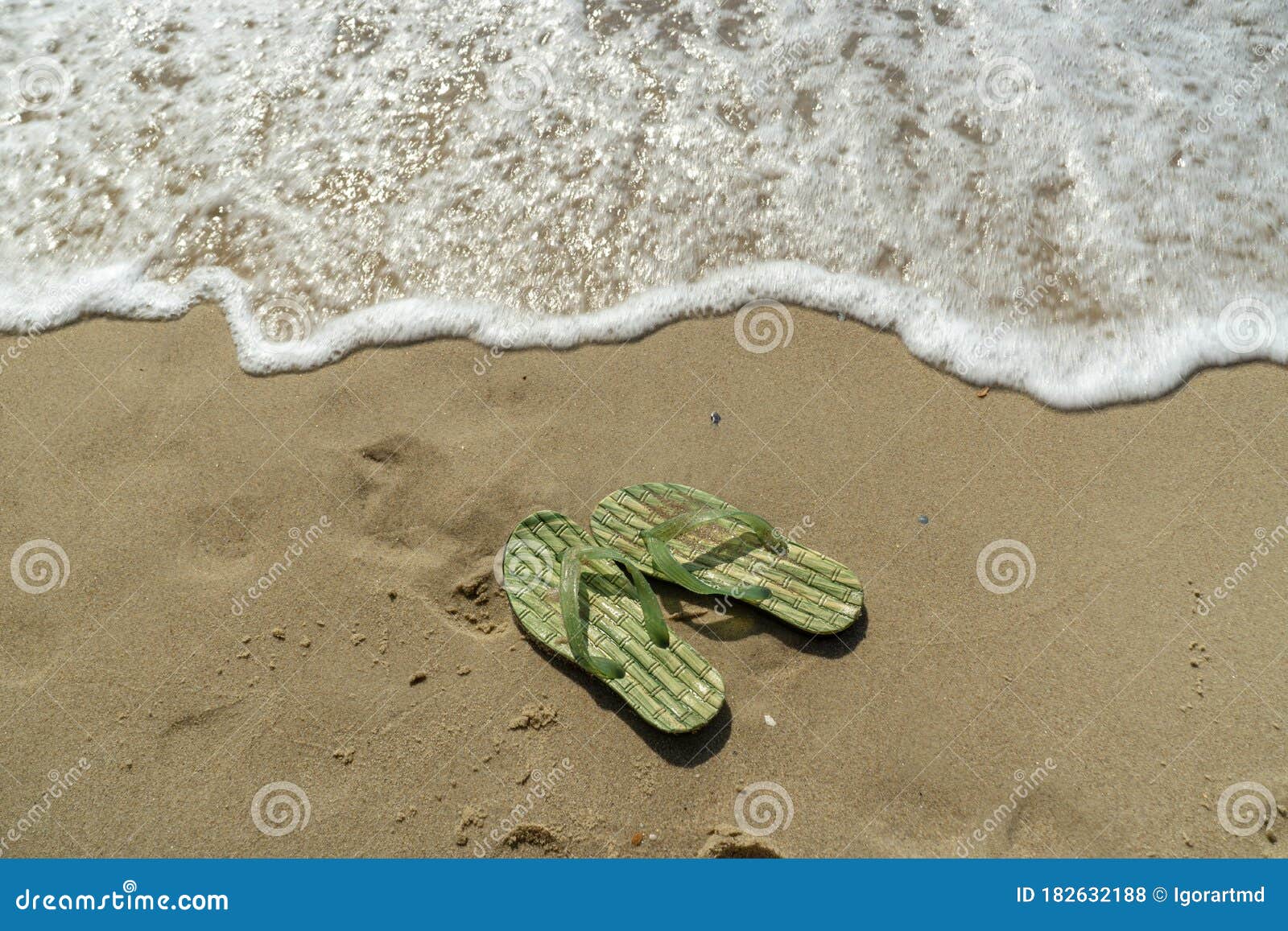 Pair, Two of Men`s Beach Slippers on the Sand Stock Photo - Image of ...