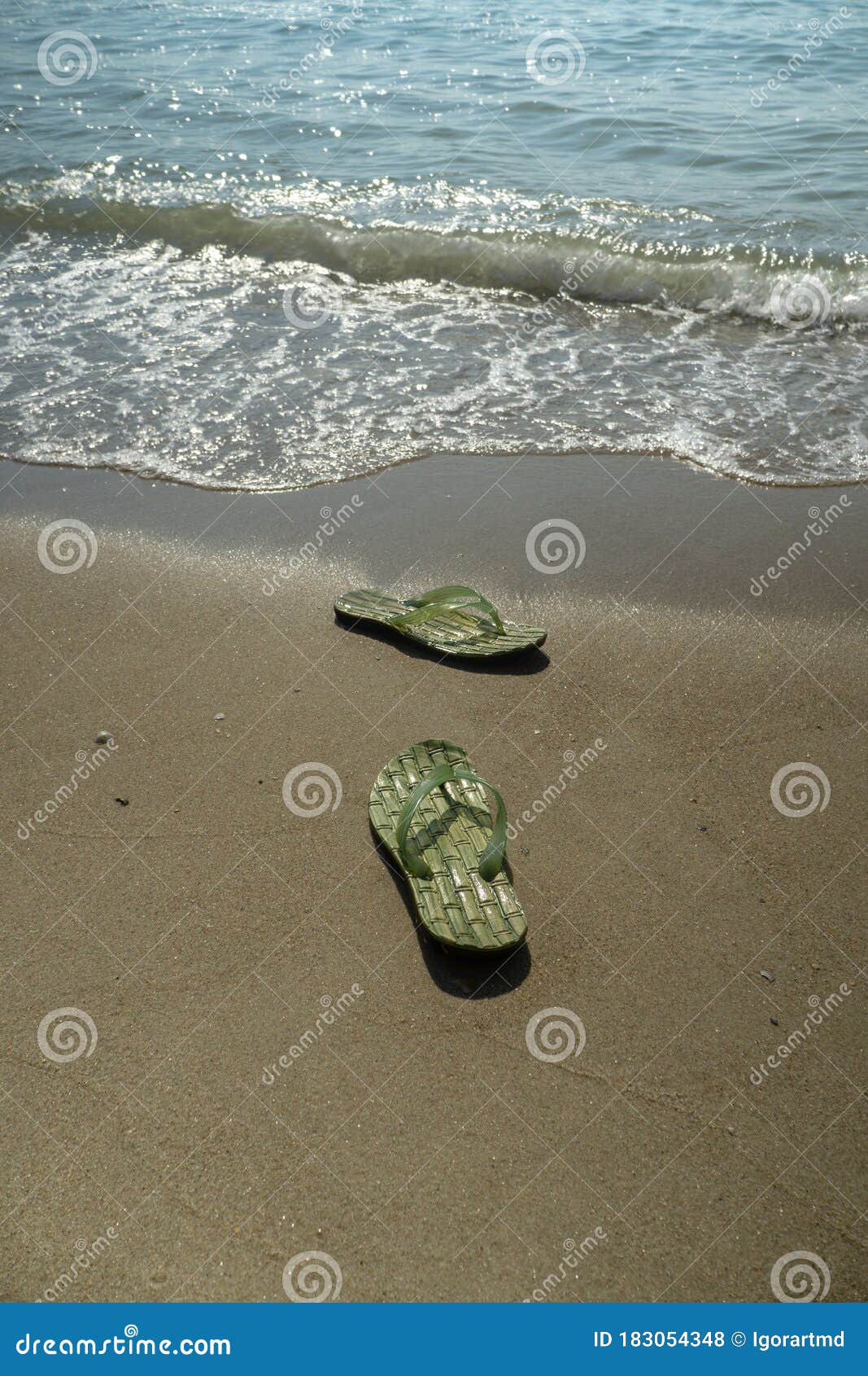 Pair, Two of Men`s Beach Slippers on the Sand Stock Photo - Image of ...