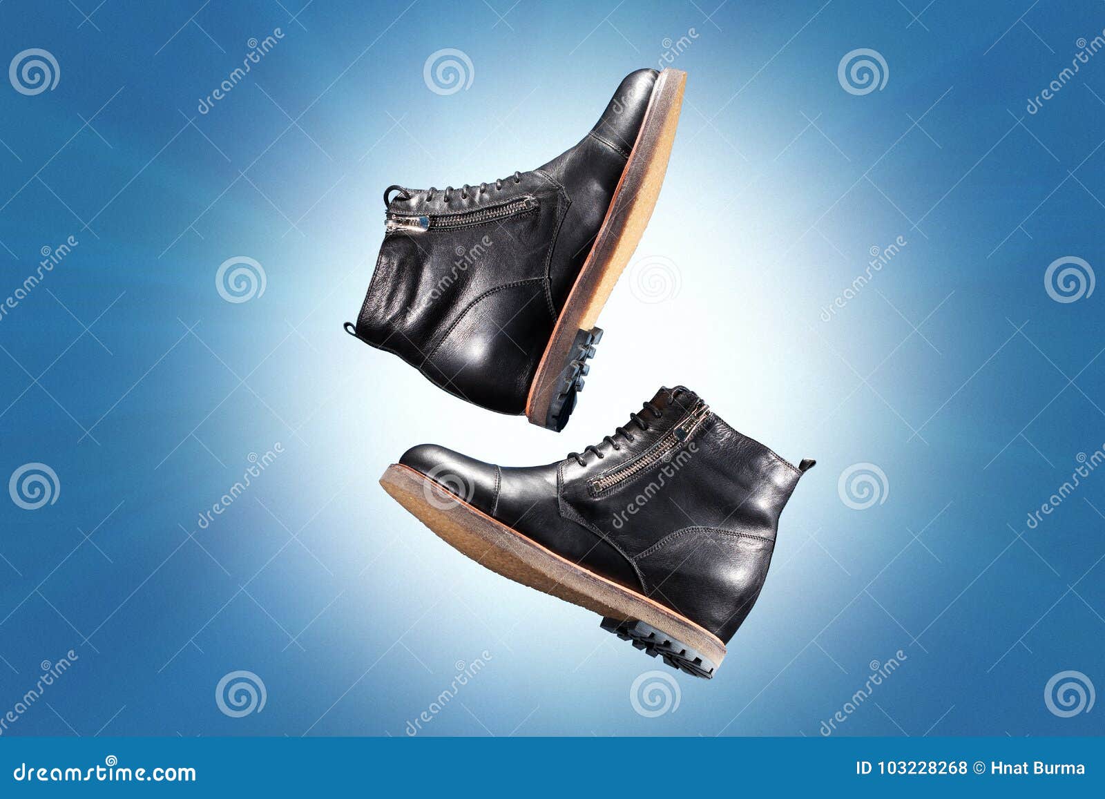 A Pair of Warm Autumn Dark Blue Leather Womens Boots on Blue Background ...