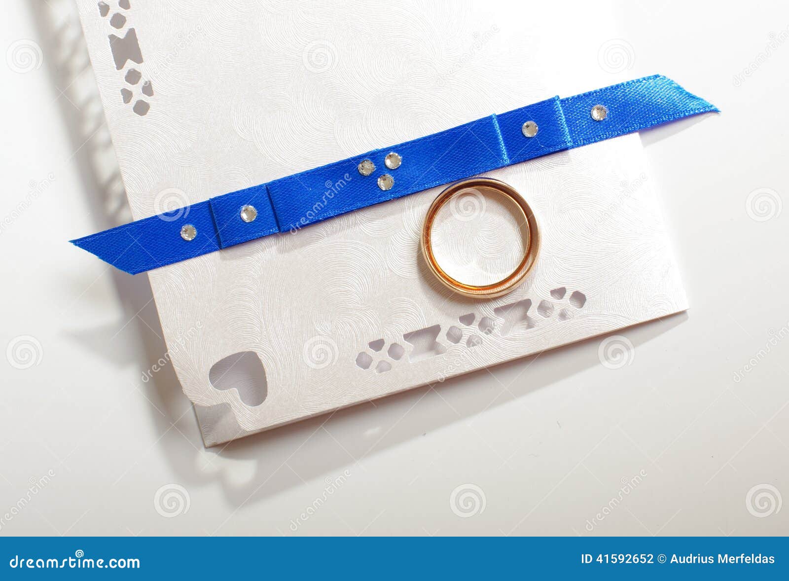 Pair of Wedding Rings on the Wedding Invitation Card Stock Photo ...