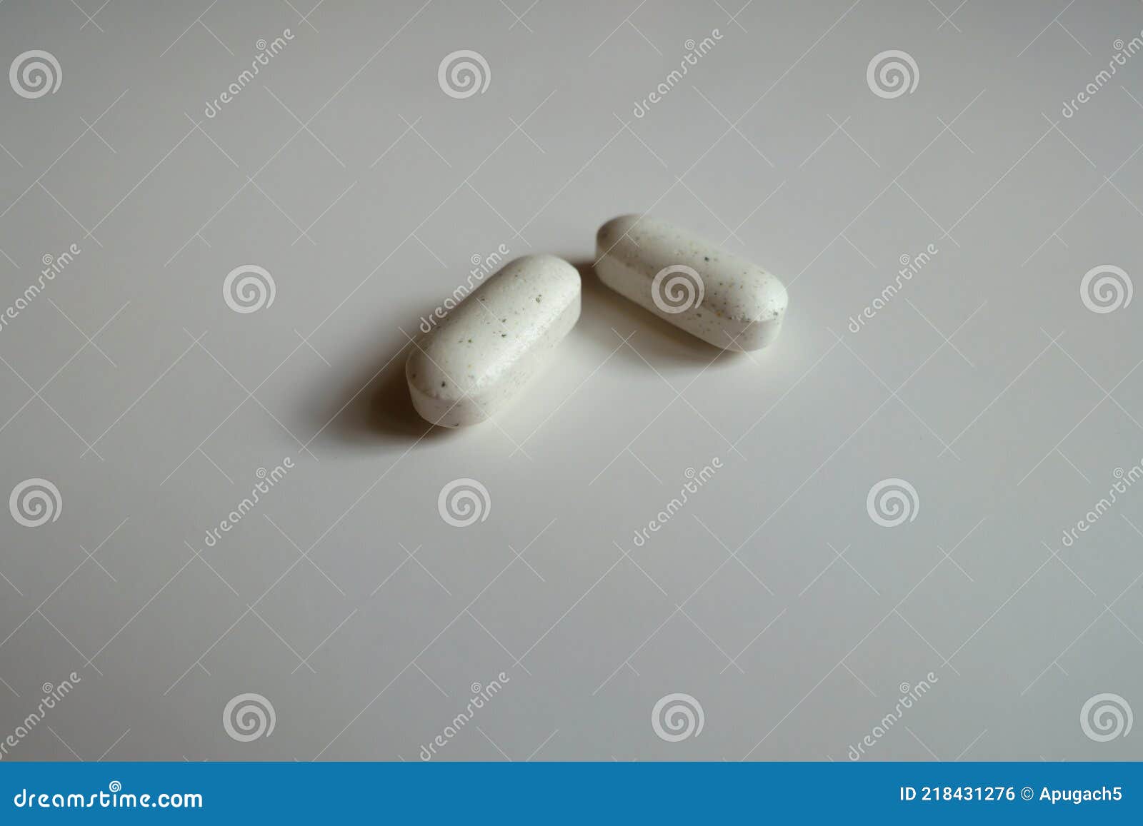 Pair of White Caplets of Kelp Stock Photo - Image of assistance ...