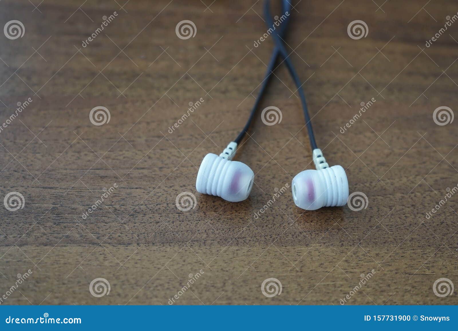 A Pair of Earphones on the Table Stock Photo - Image of earphones, pair ...