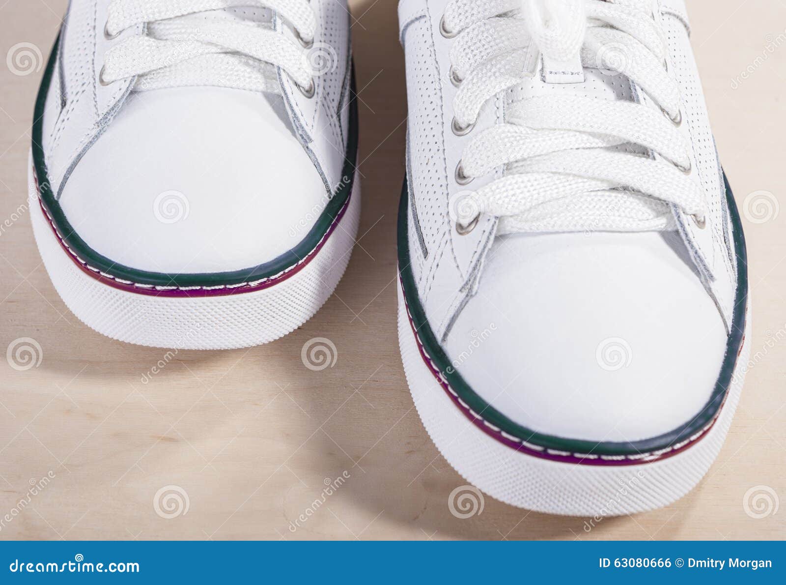 Pair of White Fashionable Laced Trainers on Wooden Surface Stock Photo ...