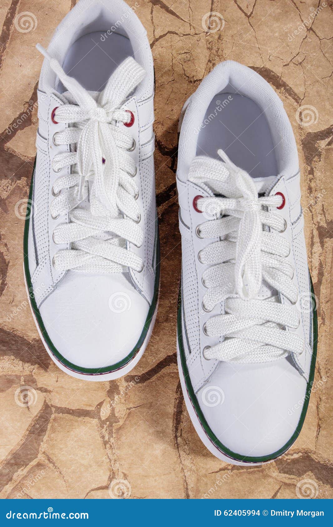 Pair of White Fashionable Laced Trainers on Wooden Surface. Stock Photo ...