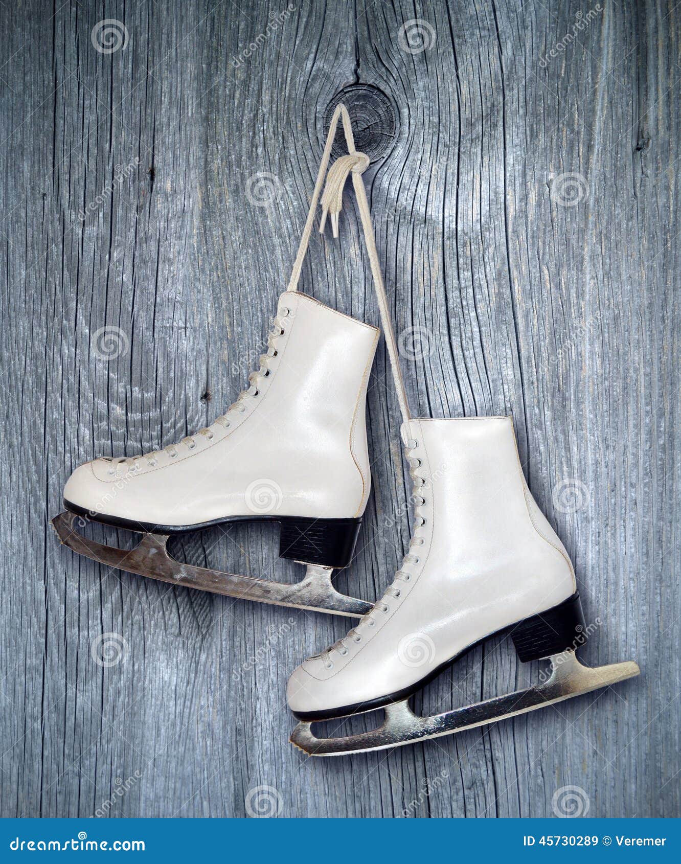 Pair of White Ice Skates on Wooden Backround Stock Image - Image of ...
