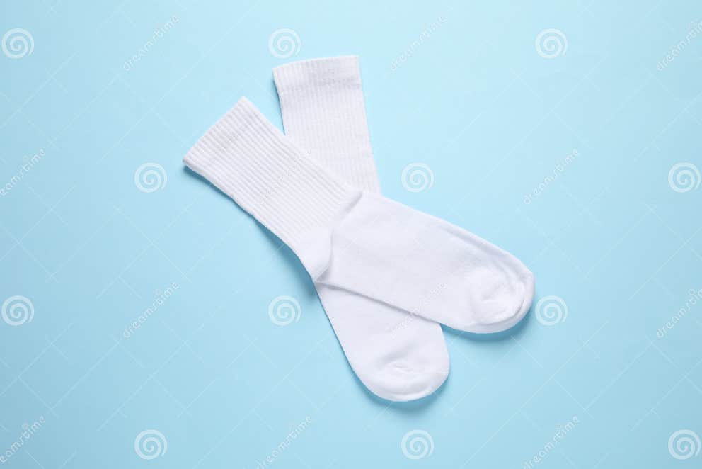 Pair of White Socks on Light Blue Background, Flat Lay Stock Image ...