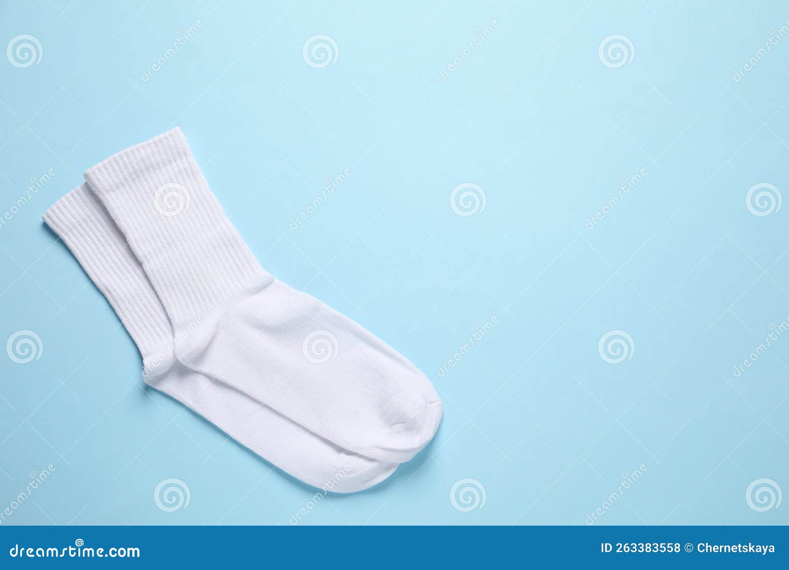 Pair of White Socks on Light Blue Background, Flat Lay. Space for Text ...