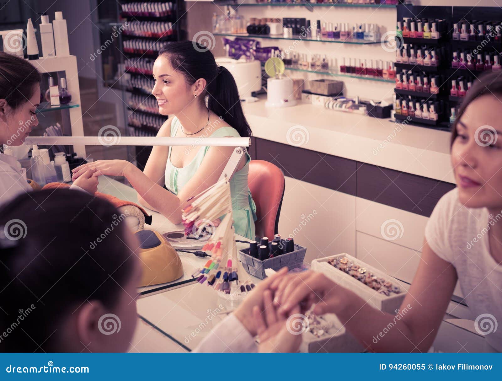 Pair of Women Clients Getting Manicure in Nail Salon Stock Image ...