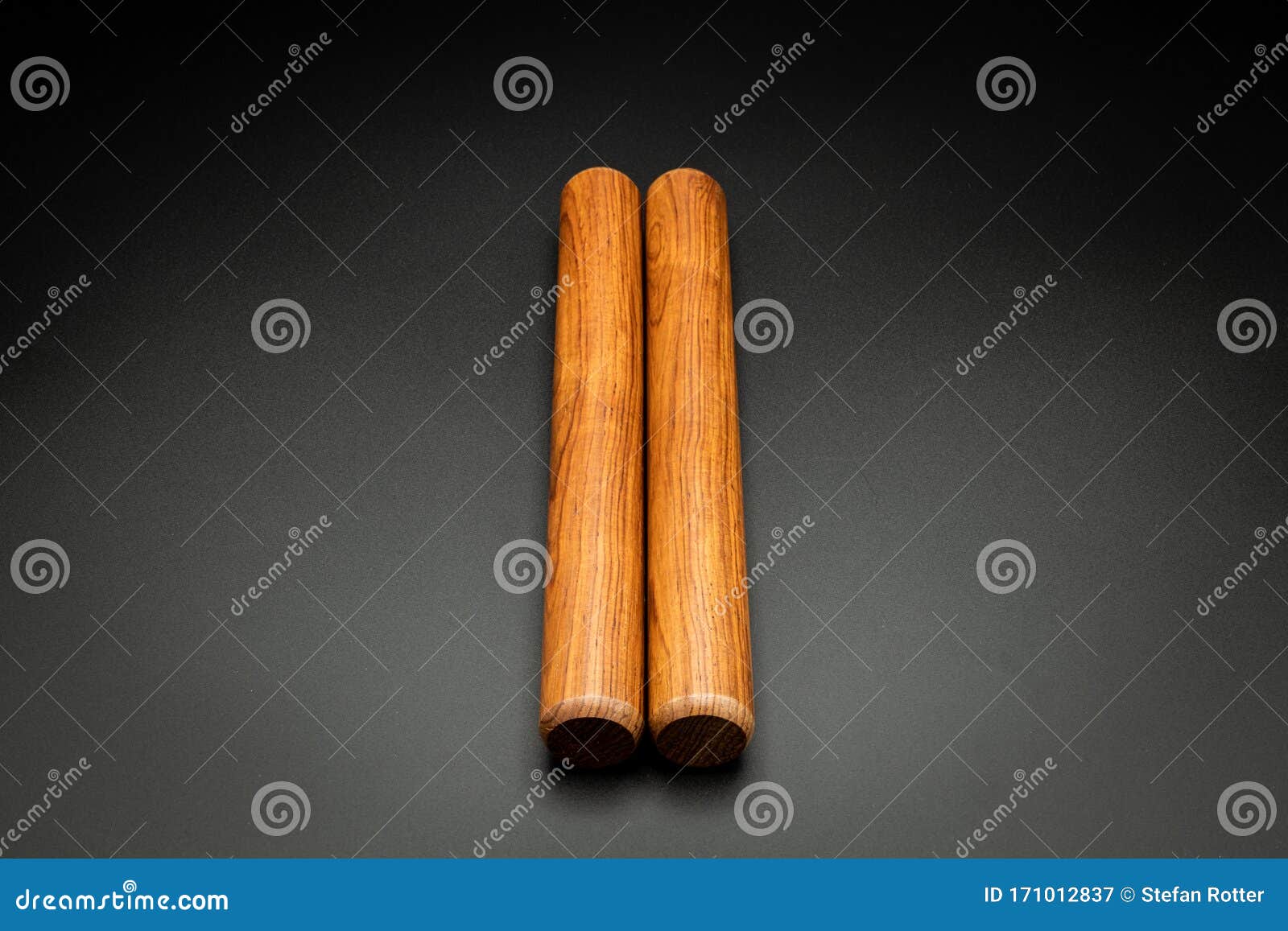 A Pair of Wooden Claves Lying on a Black Underground Stock Image ...
