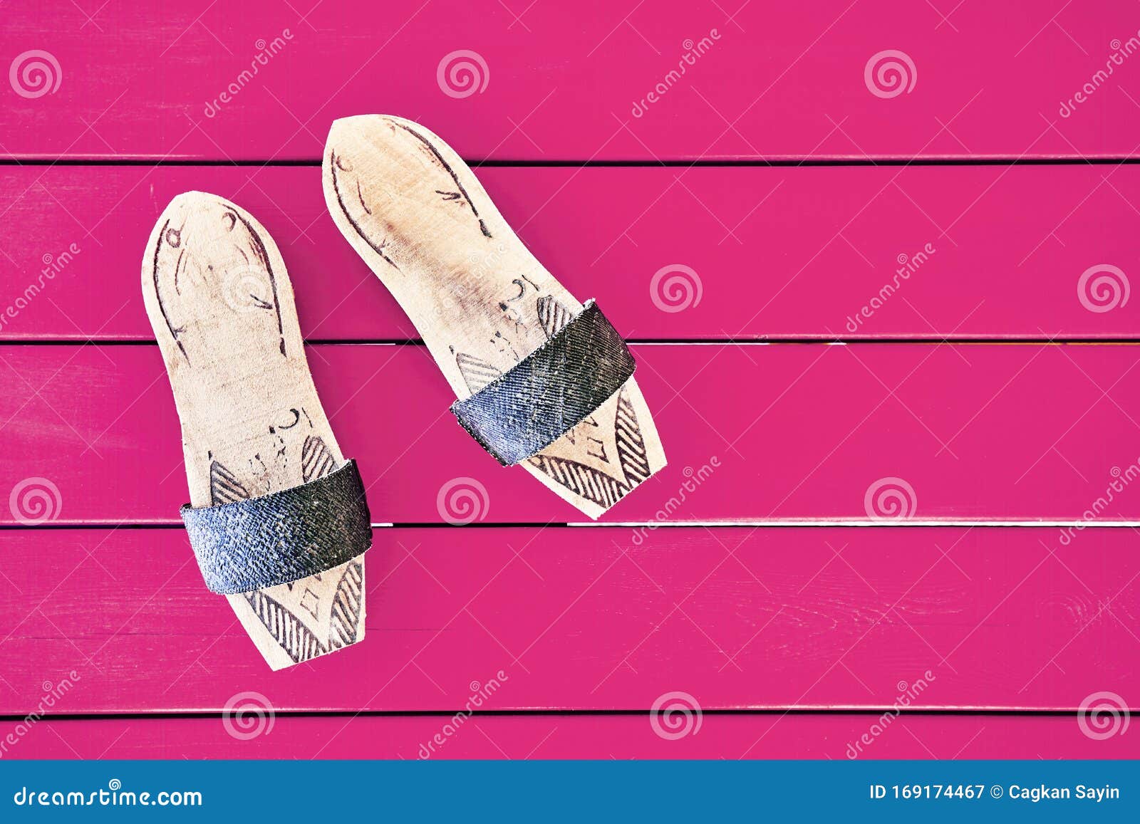 Pair of Wooden Turkish Bath Clog on Pink Wooden Table Background Stock ...