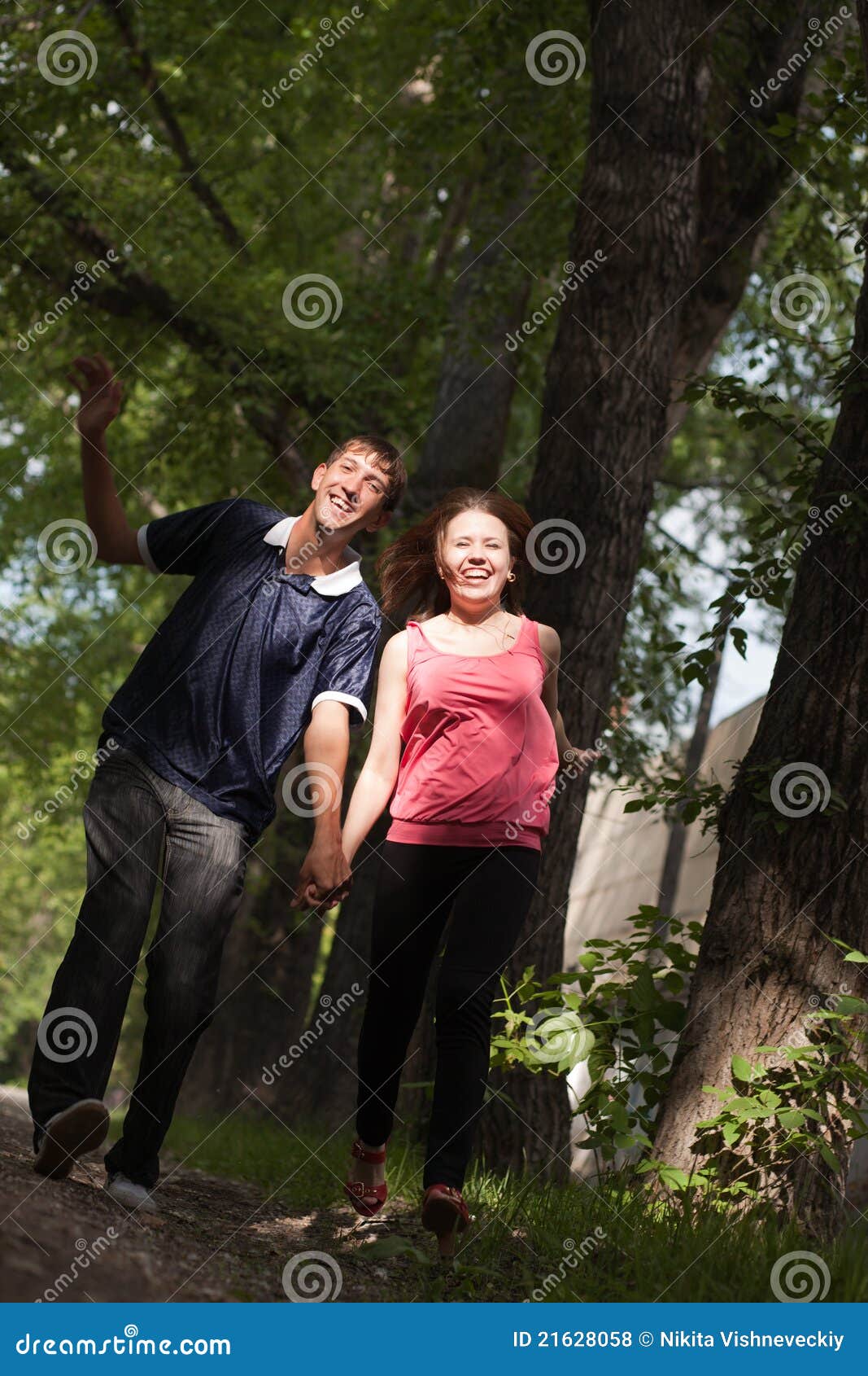 Pair of Young Lovers Running in the Park Stock Photo - Image of park ...