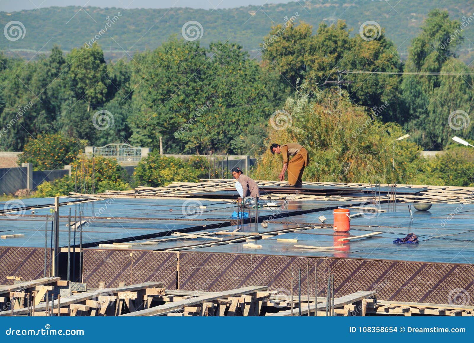 Shuttering, Lanter Labours Working on Under Construction Building ...