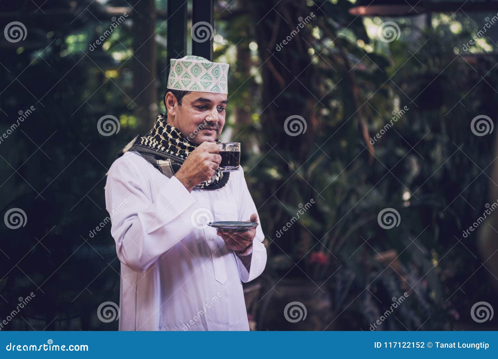Pakistani Muslim Man Standing and Drinking Coffee Stock Photo - Image ...