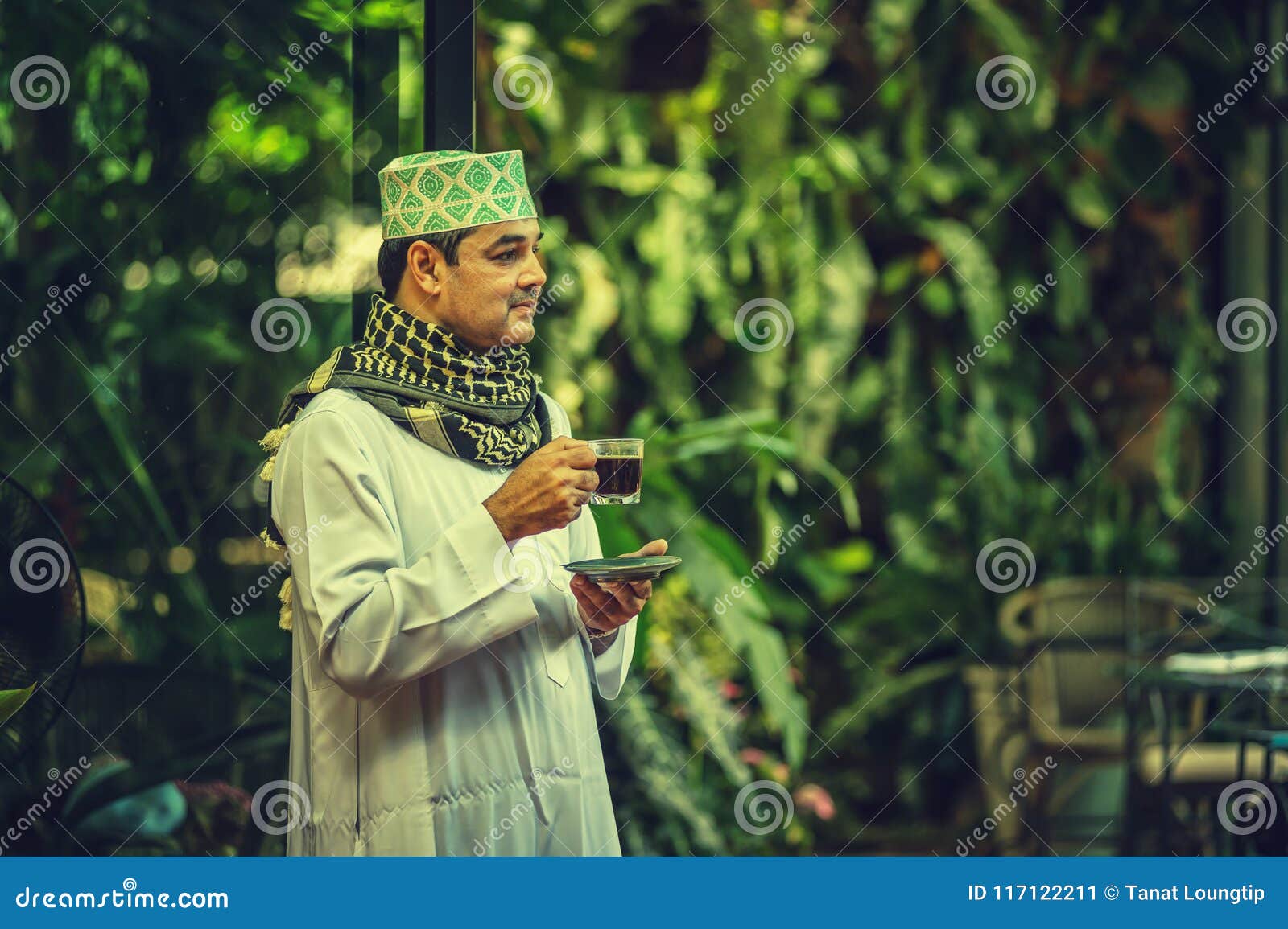 Pakistani Muslim Man Standing and Drinking Coffee Stock Image - Image ...