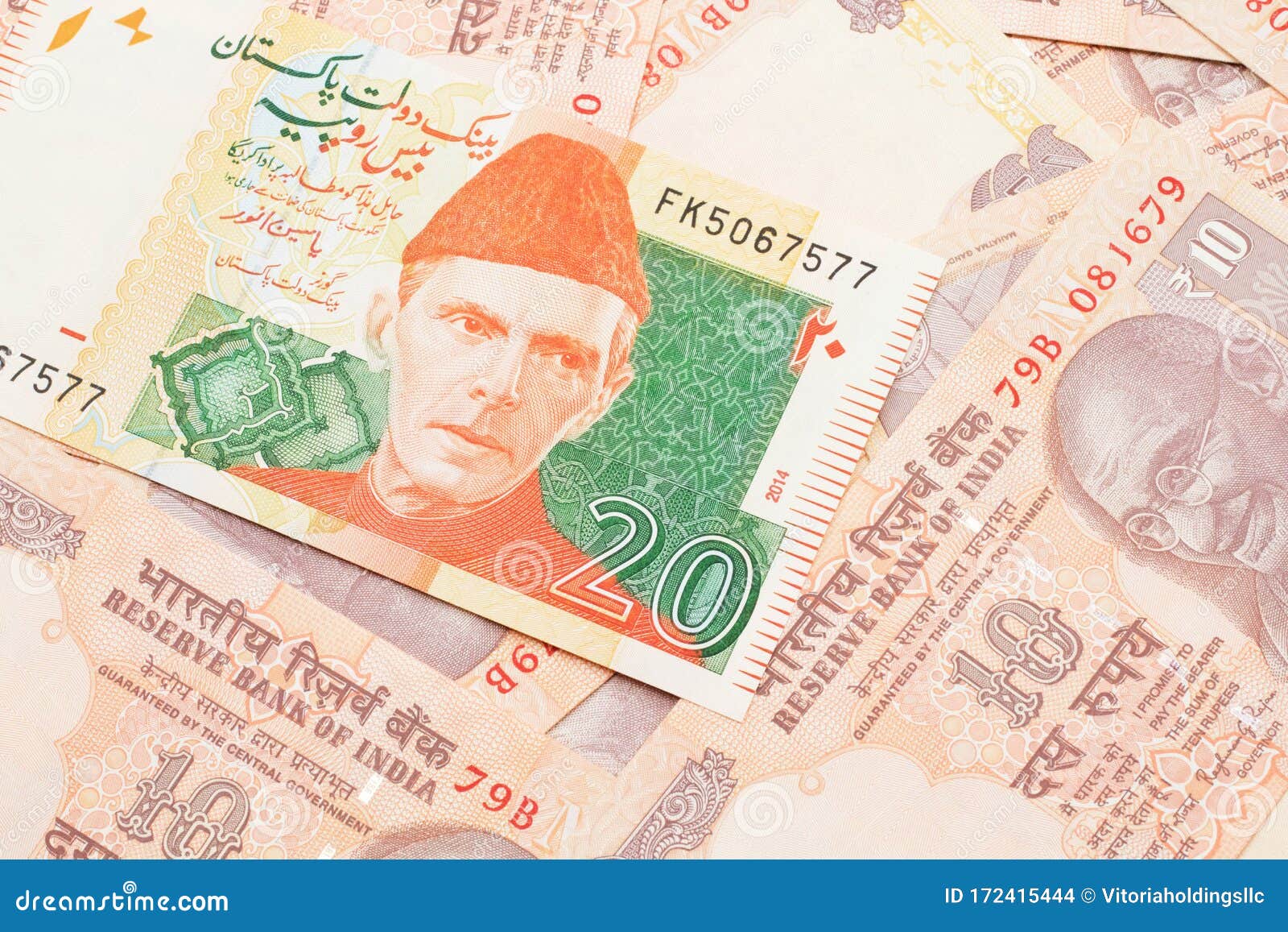 A Pakistani Rupee Bank Note with Indian Twenty Rupee Bank Notes Stock ...