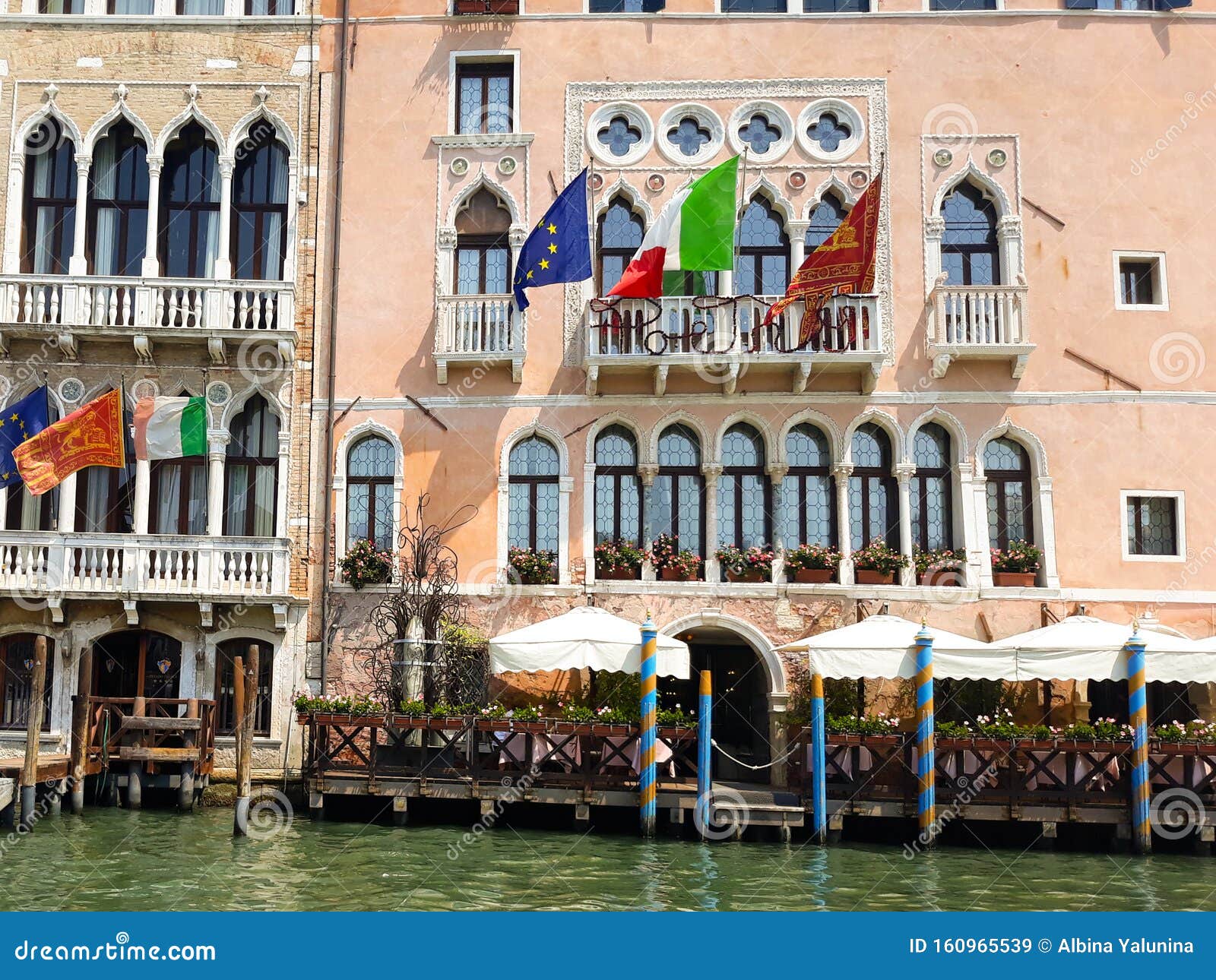 Palace, with Gothic Windows and Balconies with Flags. Stock Image ...