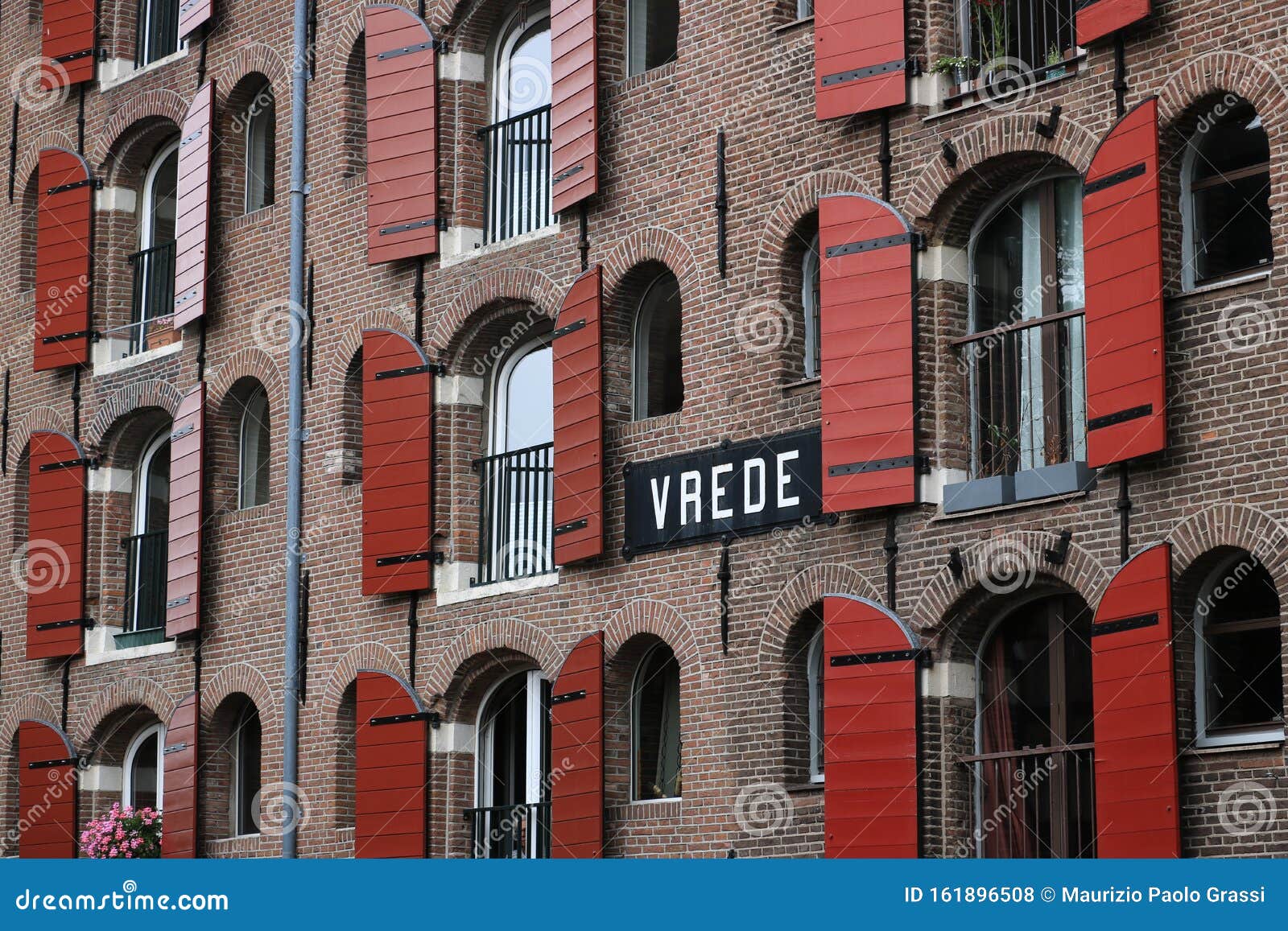 Palace Windows with Brick FaÃ§ade in Amsterdam. Vrede Editorial Stock ...