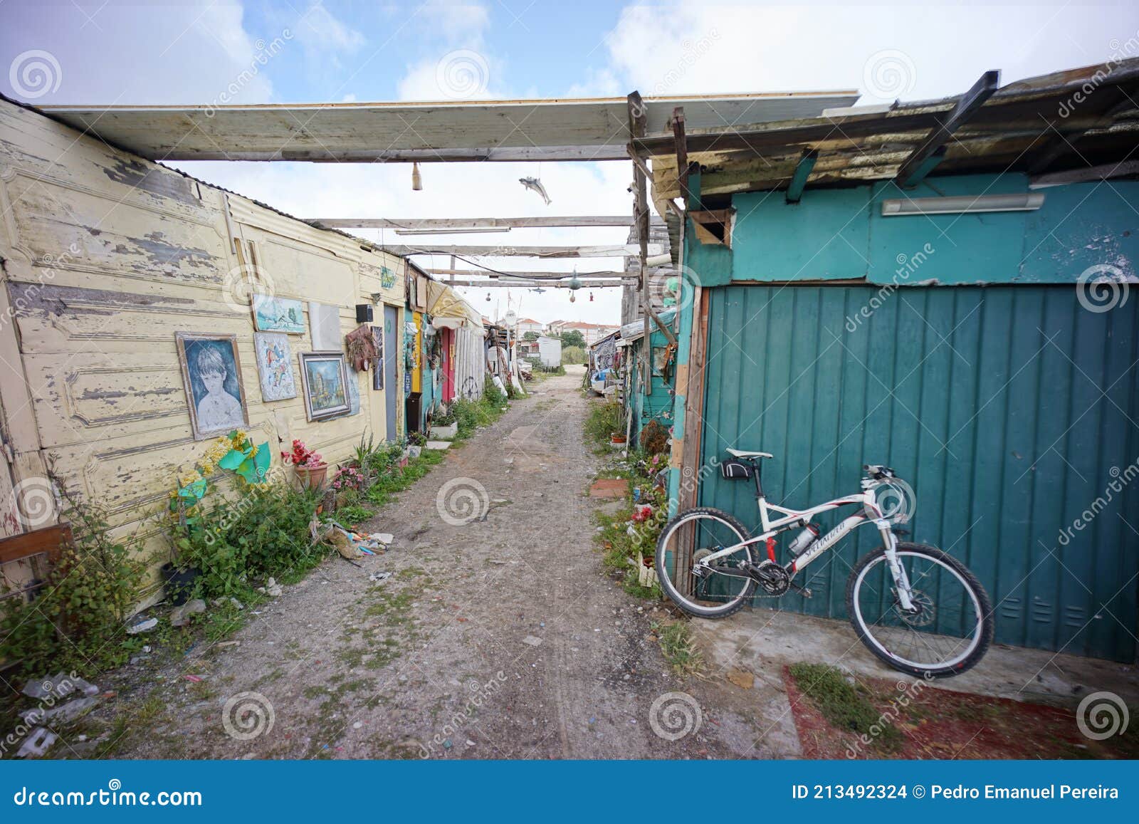 A Pier Built From Tropical Timber Stretches To A Thatched Hut ...