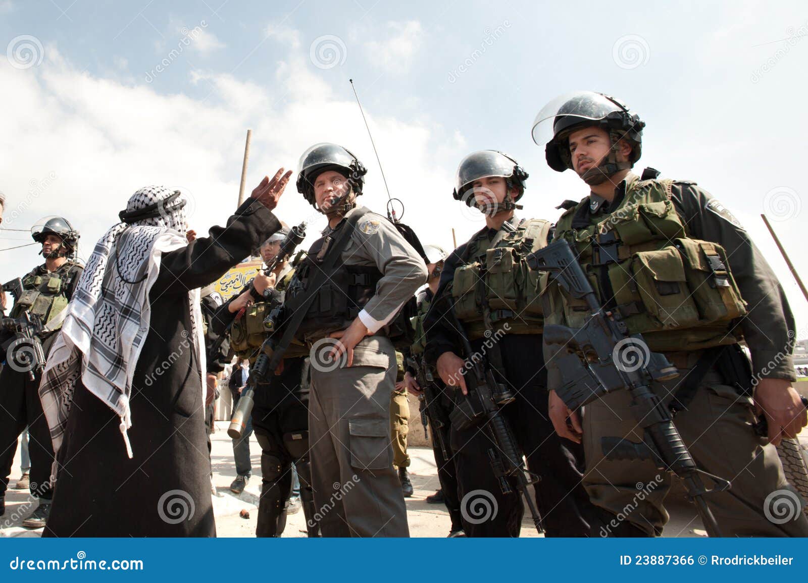 Palestinian Man Confronts Israeli Soldiers Editorial Photo - Image of ...