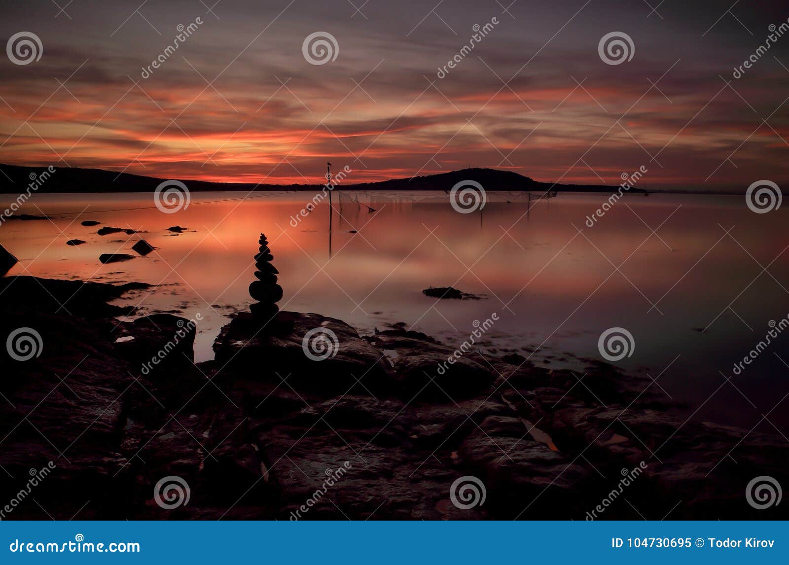 A Palette of Color at Sunset Forms Fiery Flames in the Clouds... Stock ...
