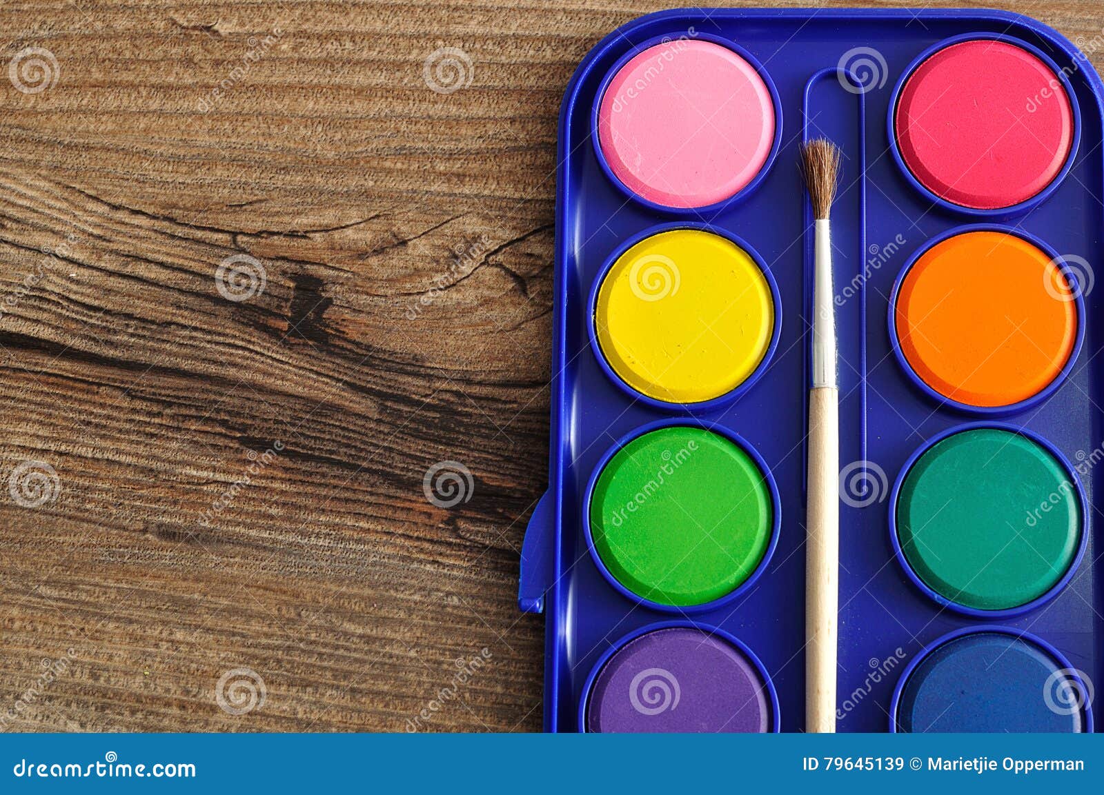 A Pallet of Colorful Water Paint in a Blue Plastic Container Stock ...