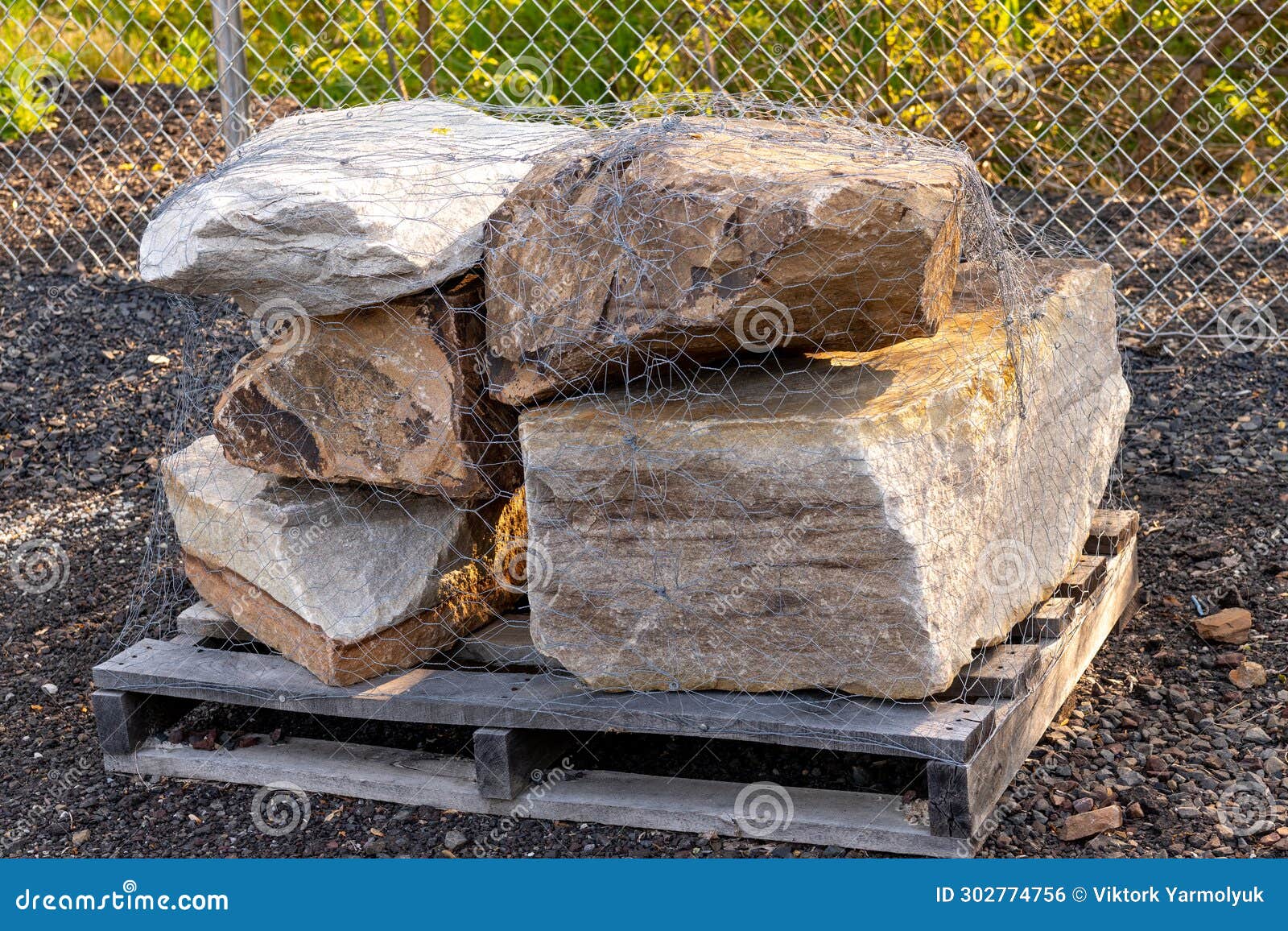Pallet with large stones stock photo. Image of piled - 302774756