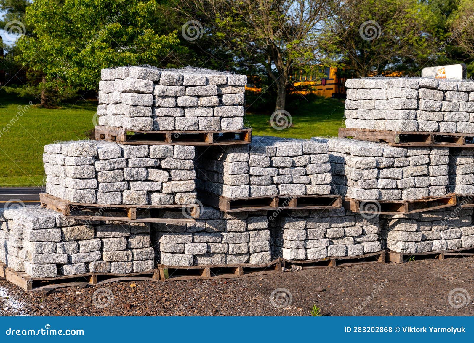 Pallets with Natural Facing Stone and Cobblestones Stock Photo - Image ...