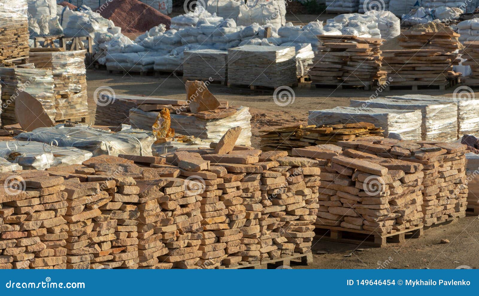 Pallets with Natural Facing Stone and Cobblestones Stock Photo - Image ...