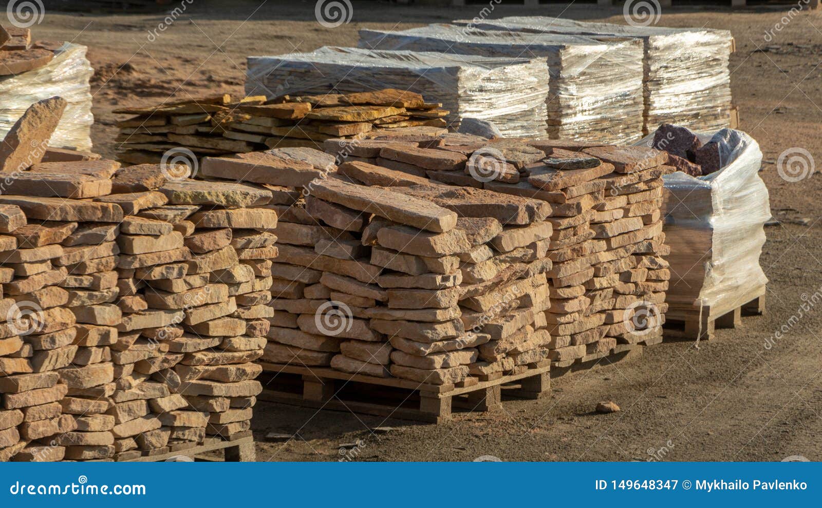 Pallets with Natural Facing Stone and Cobblestones Stock Image - Image ...
