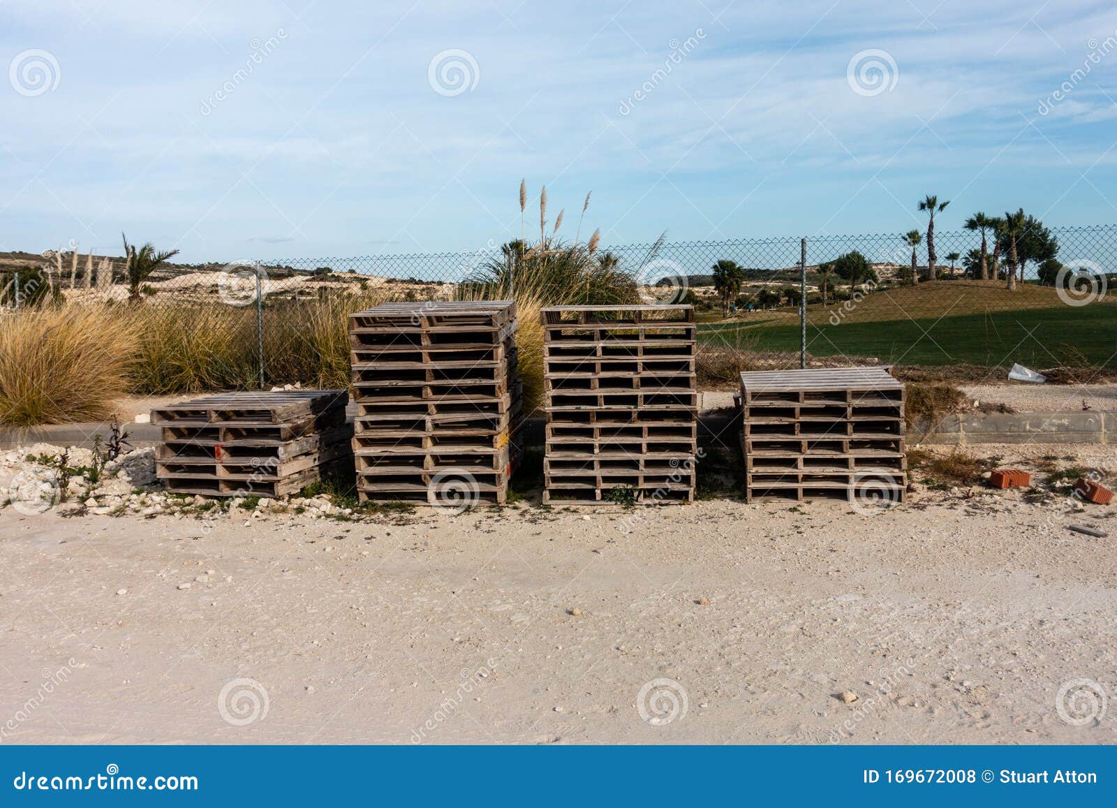 Pallets Piled At Roadside Stock Photo | CartoonDealer.com #169672008