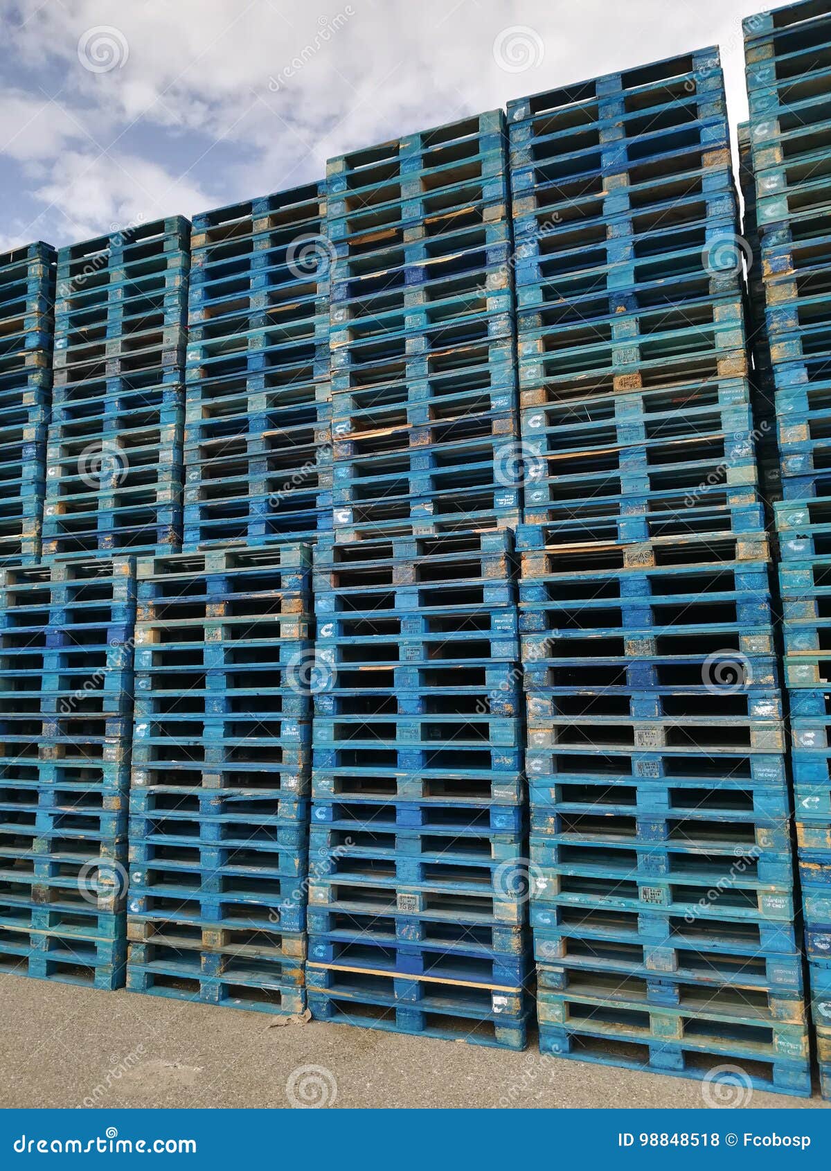 Pallets in a row stock photo. Image of logistics, packing - 98848518